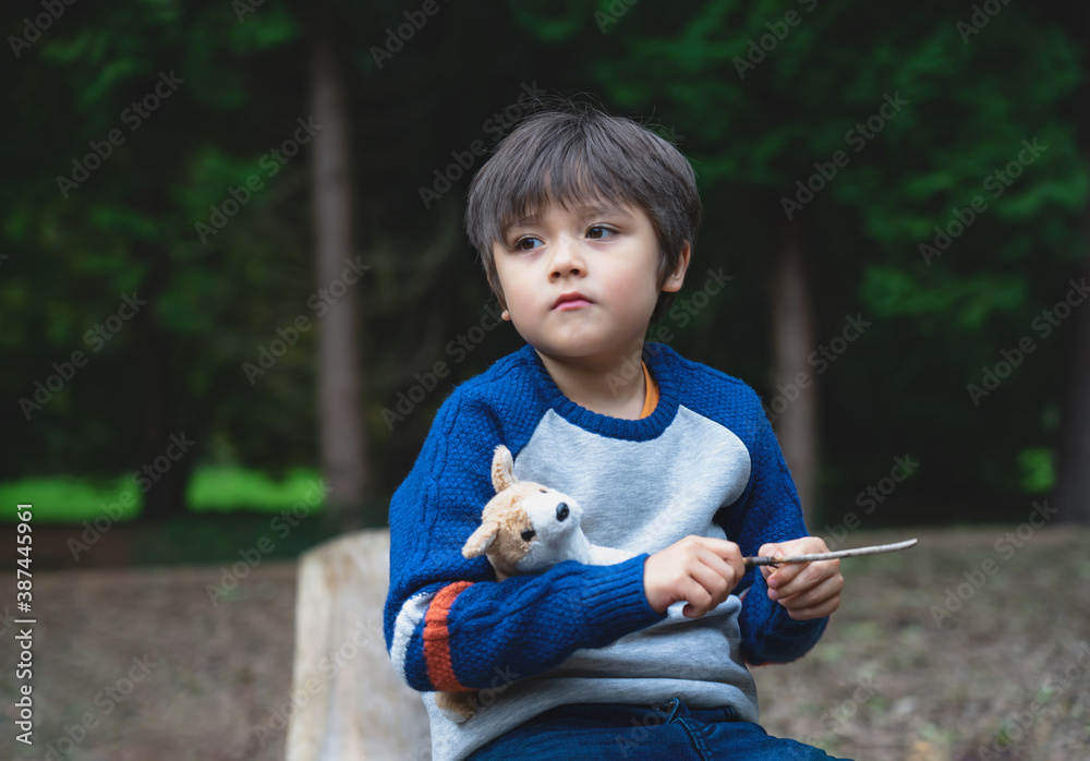 Sad Child Playing Alone