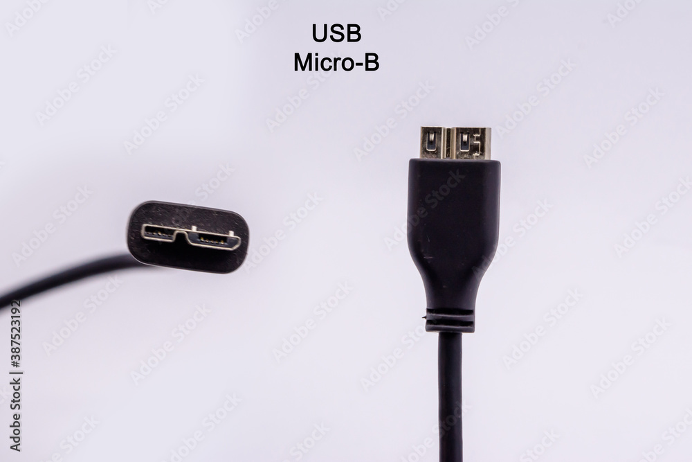 Fotka „Micro USB type B cable from different angles isolated against ...