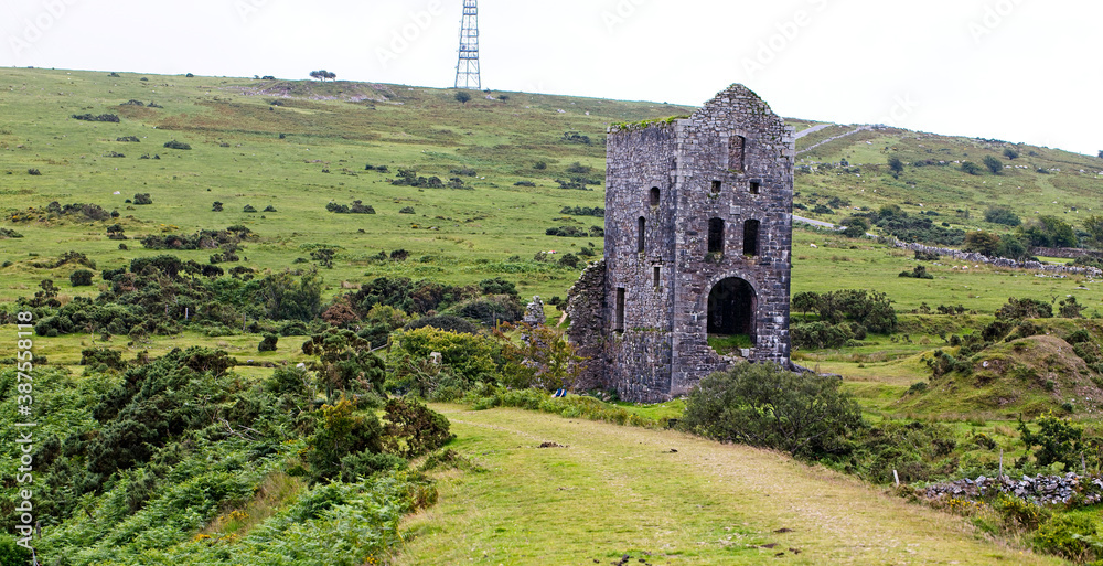 An old ruined Cornish mine building and rail trackbed near Caradon Hill ...