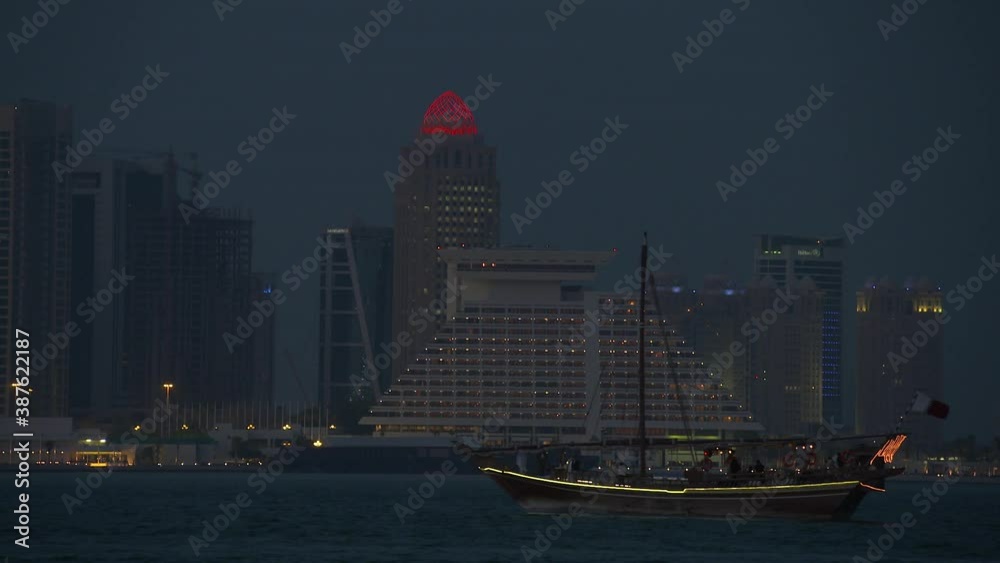 Doha city Qatar waterfront skyline at night with dhow Stock ビデオ | Adobe ...