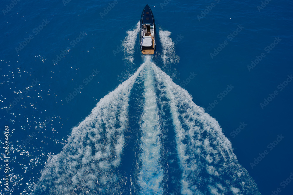 Top back view of the boat. Speed boat movement at high speed aerial ...