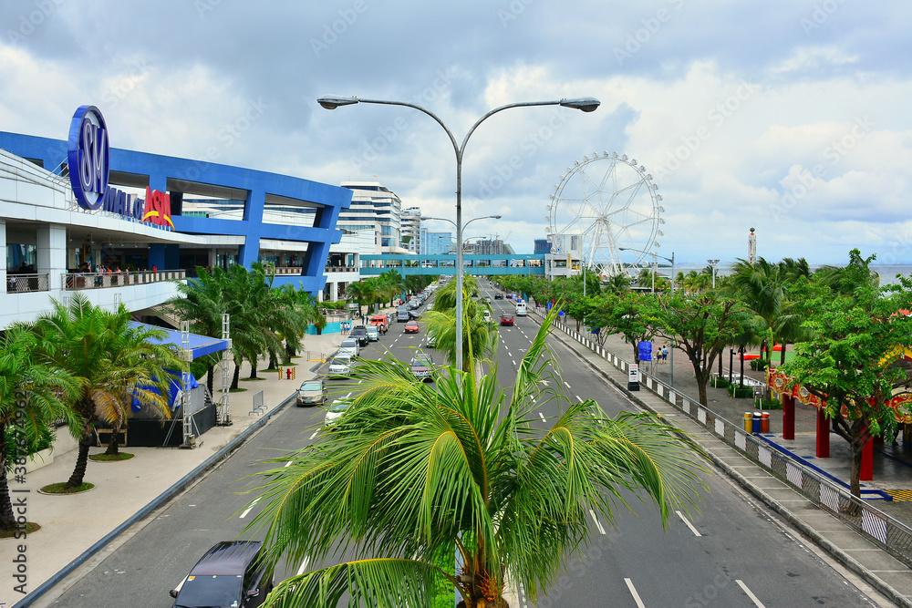 SM Mall of Asia mall facade and road in Pasay, Philippines Stock Photo ...