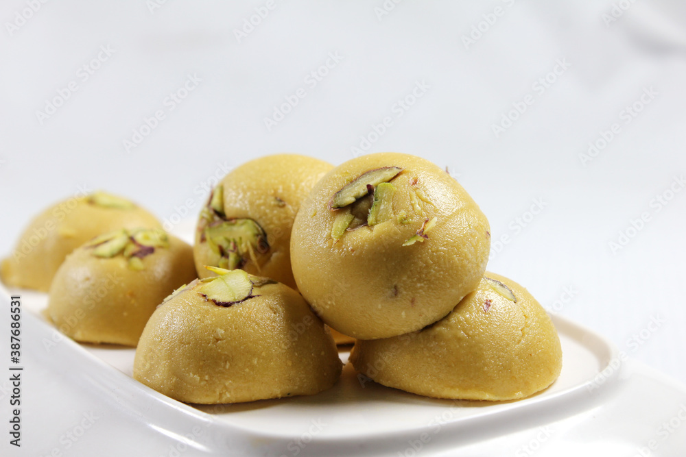 Besan ki Burfi or besan ke ladoo is Traditional Indian sweet made from ...