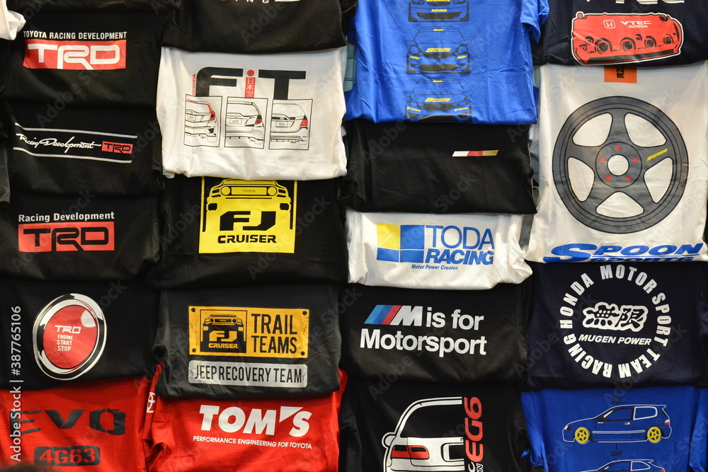 Assorted shirt design display at Manila Auto Salon car show in Pasay ...