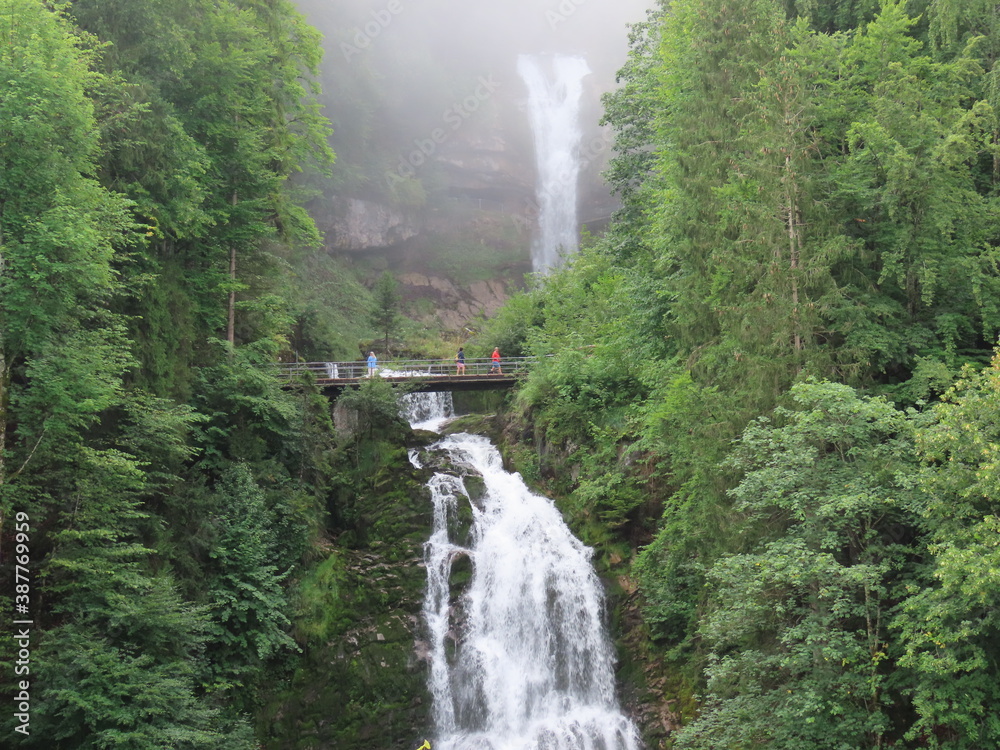 Giessbach Falls in the eponymous nature park and over Lake Brienz ...