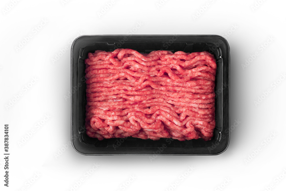 Black opened plastic tray with fresh raw minced meat top-view ...