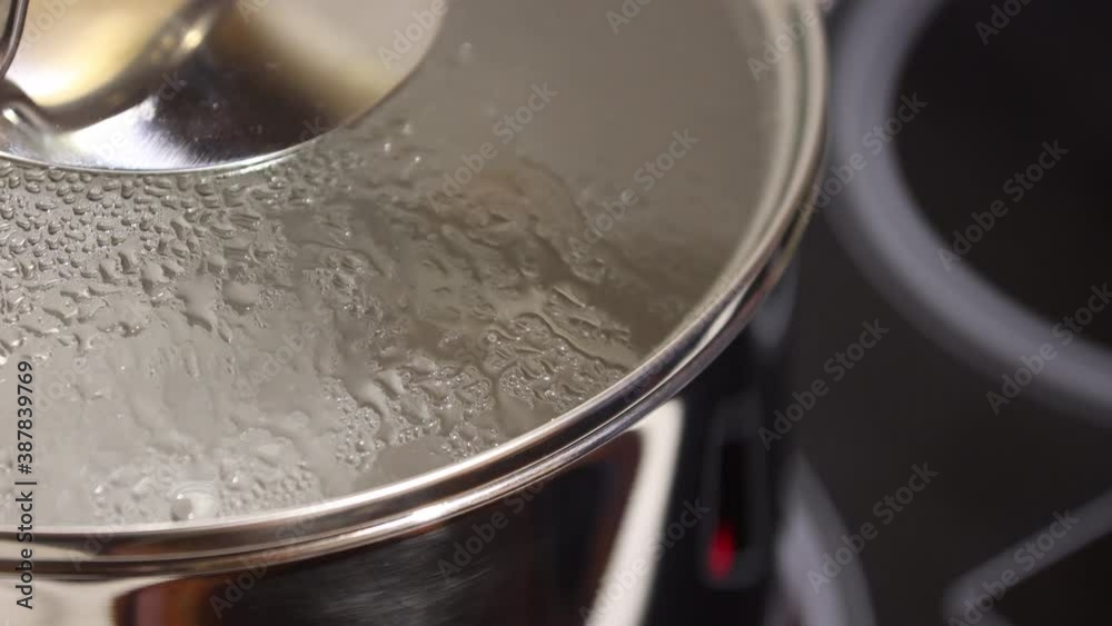 Water Boiling In Saucepan, Bubbles From Boiling Water. Cooking Pot Full ...