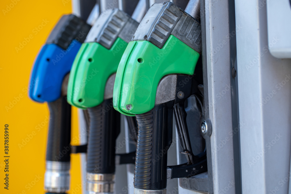 Fuel pumps at a gas station. Color fuel gasoline dispenser. Stock Photo ...