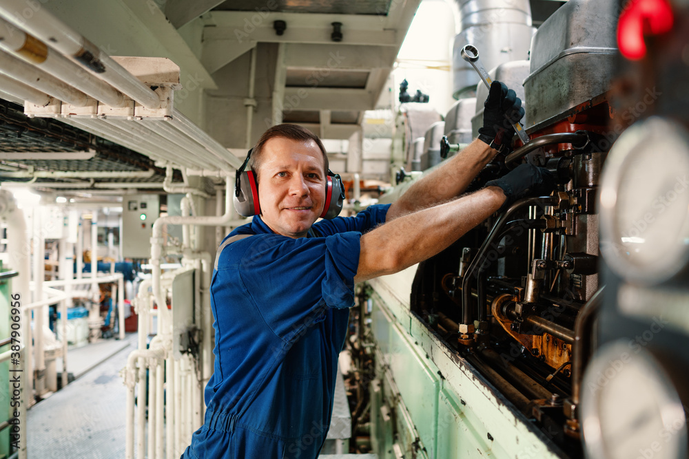 Marine engineer officer controlling vessel enginesand propulsion in ...