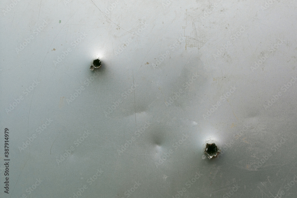 grunge metal background with ragged bullet holes Stock Photo | Adobe Stock