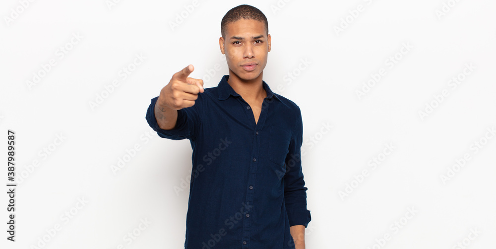 young black man pointing at camera with an angry aggressive expression ...