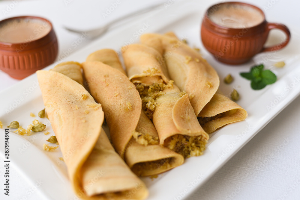 Traditional pancakes and Indian milk tea , crepe pancake, Kerala tea ...