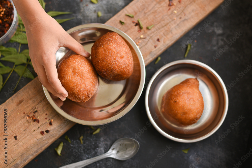 Sweet Bonda , Vellam Bonda , girl hand take Banana Bonda fritters Undan ...
