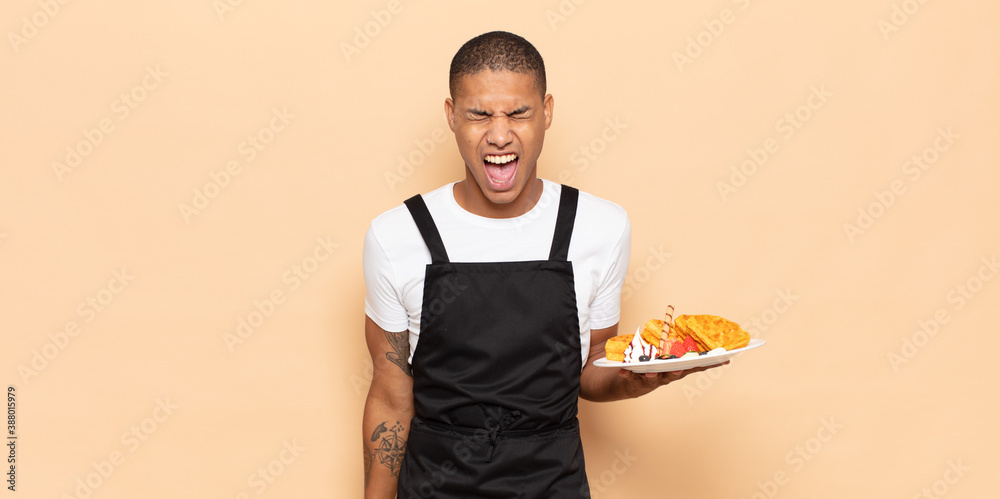 young black man shouting aggressively, looking very angry, frustrated ...