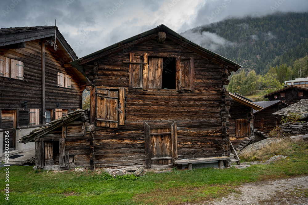typical traditional wooden house in the village of Finnen in Upper ...