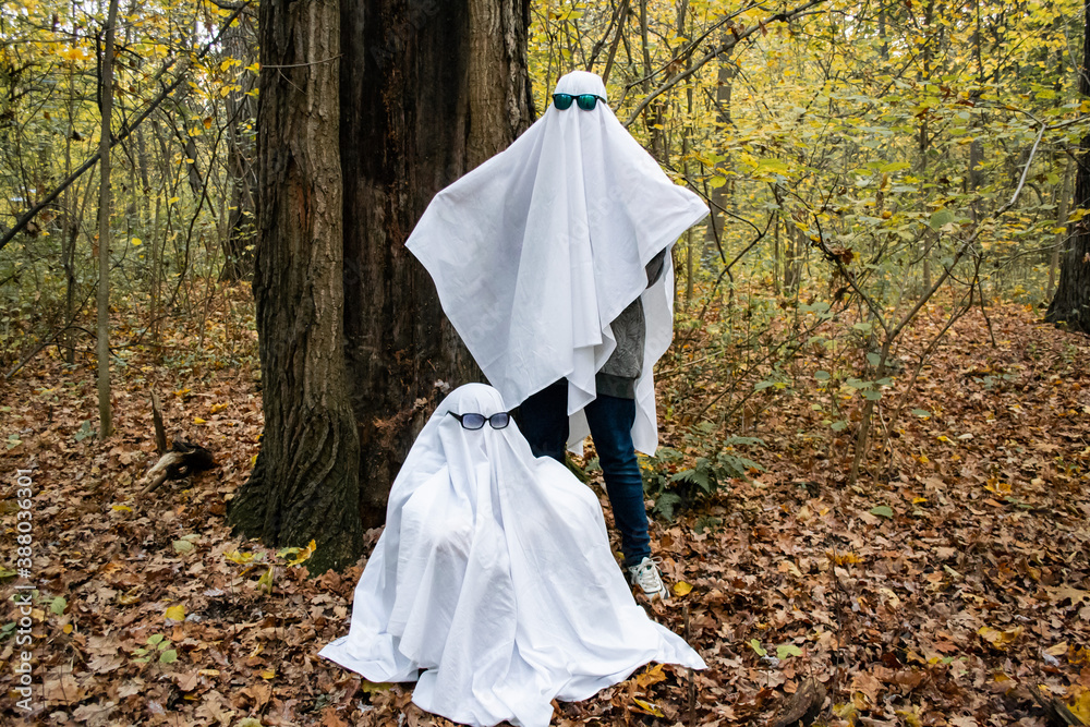 Ghost challenge in the forest. Two unrecognizable people teenagers ...