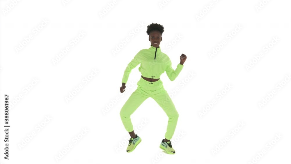 African woman dancing in hip hop style, rhythmically moving body ...