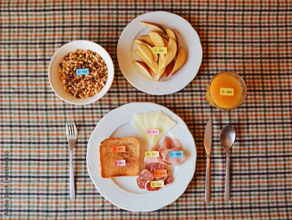 Food in a table. Additives in a common breakfast. Representation of ...