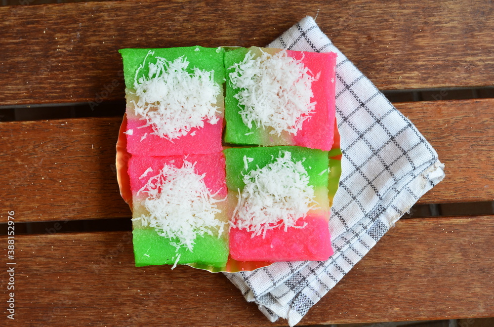 Gethuk lindri or food from Cassava and coconut at the wood table ...