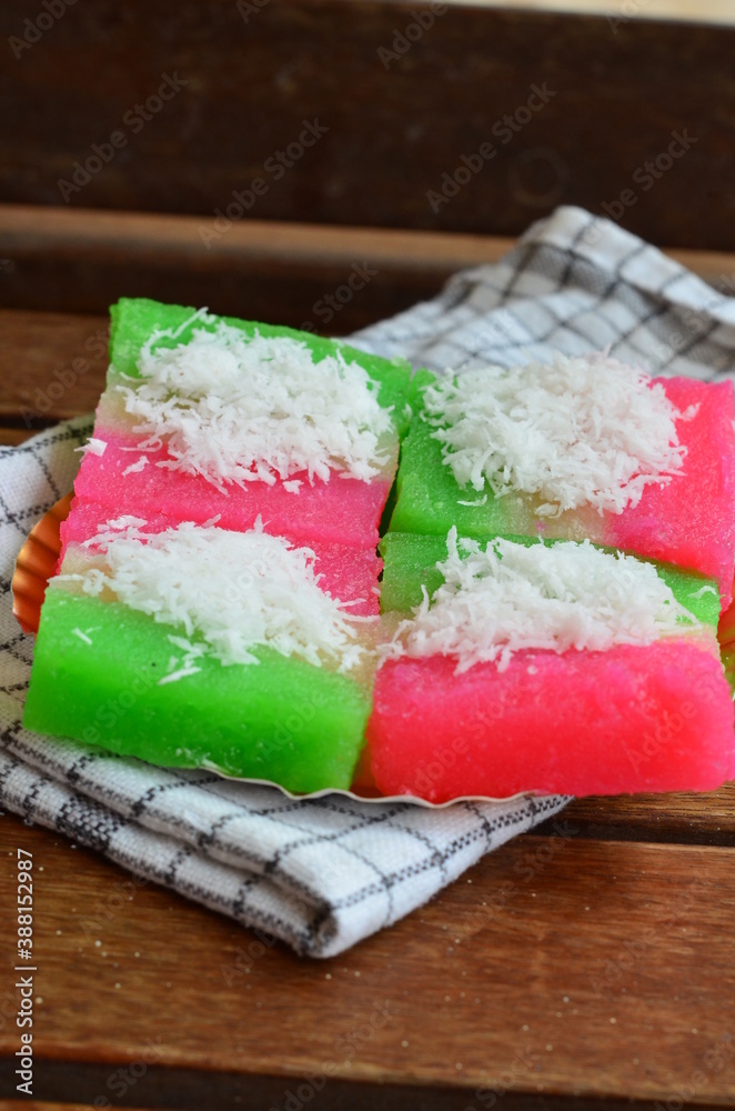 Gethuk lindri or food from Cassava and coconut at the wood table ...