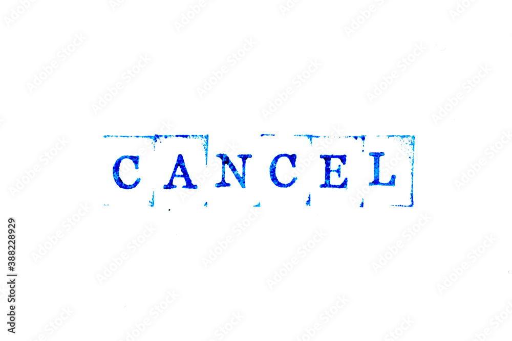 Blue color ink of rubber stamp in word cancel on white paper background ...