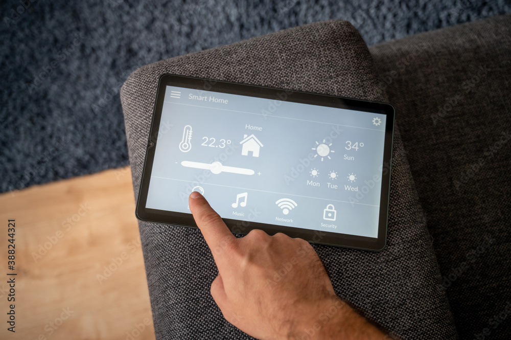 modern smart home control app with flat interface on a black tablet ...