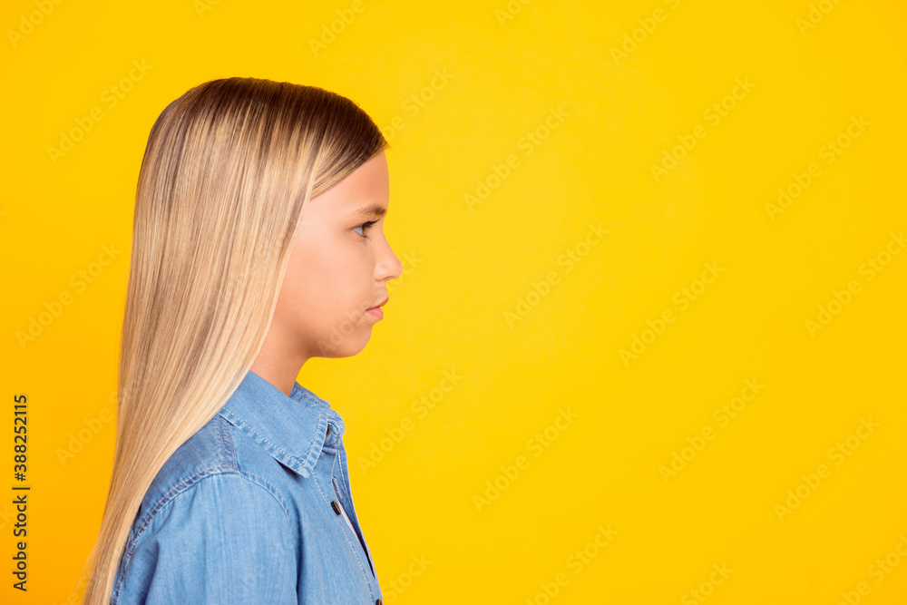 Side profile photo of pretty serious calm little girl wearing denim ...