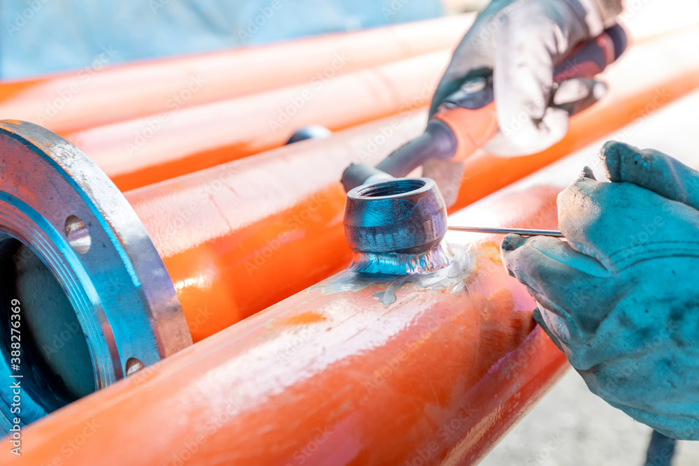 View of the weldolet fitting weld of the pipe with gas tungsten arc ...