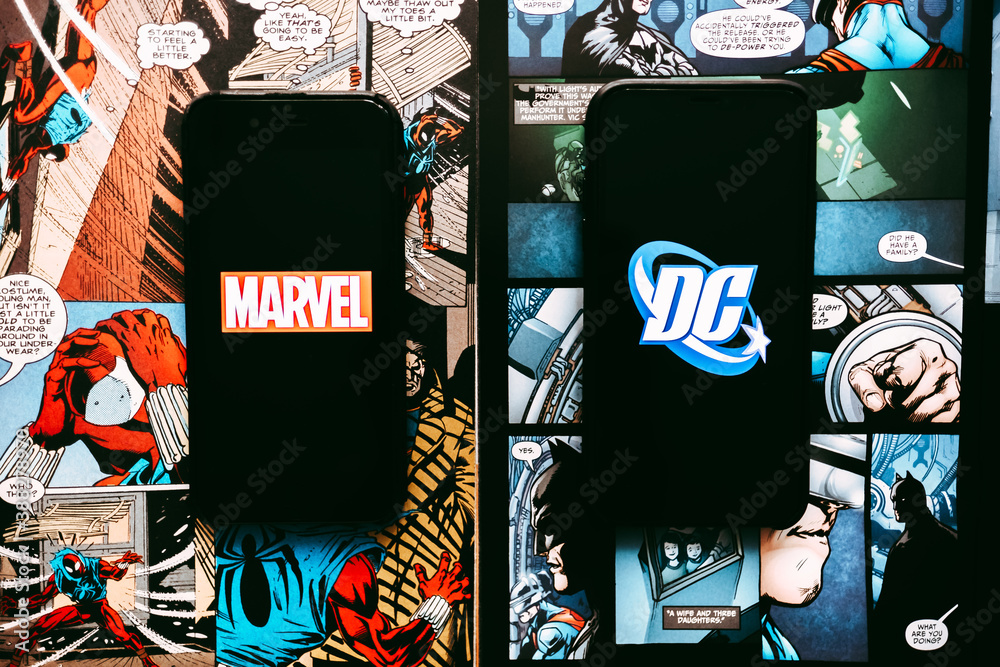 Marvel and DC logo on the comic book page background. Rostov-on-Don ...