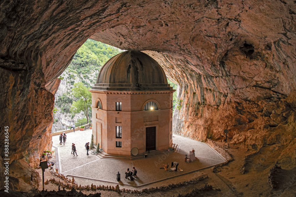 Top view of the Sanctuary of the Madonna di Frasassi, immersed in a ...