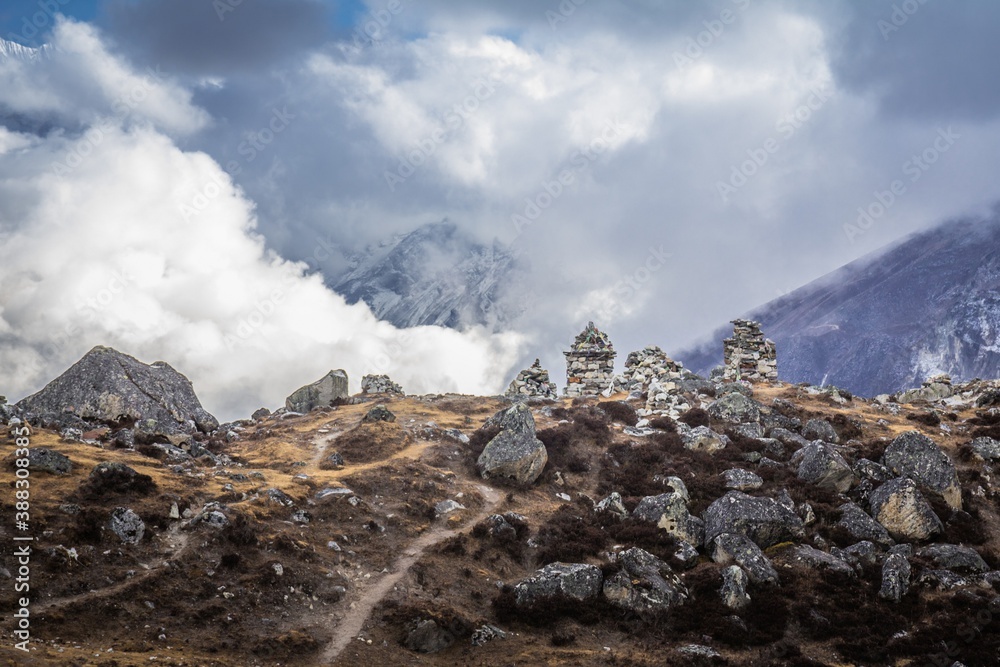 Impressive Himalaya mountains which peaks covered with white clouds ...
