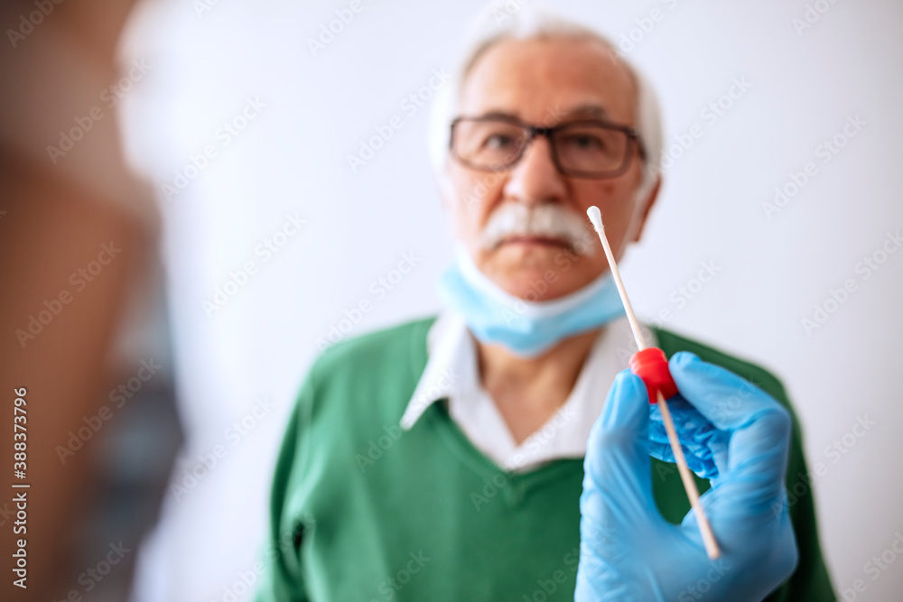 Lab technician holding swab collection kit,Coronavirus COVID-19 ...