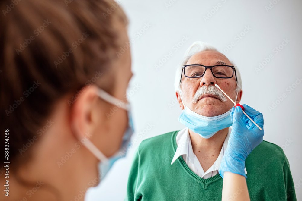 Lab technician holding swab collection kit,Coronavirus COVID-19 ...