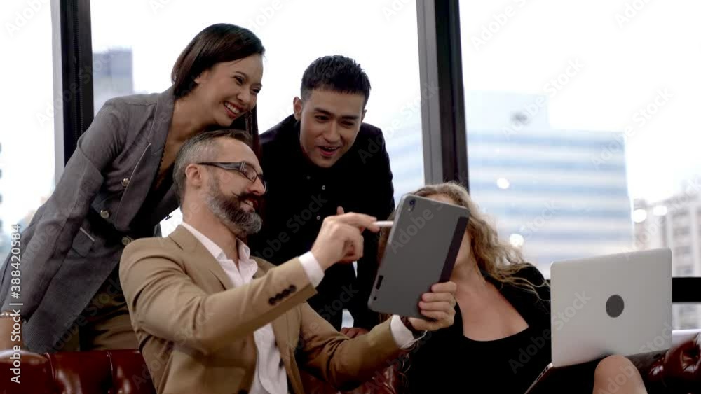 executive leader senior presenter shows presentation in modern office ...