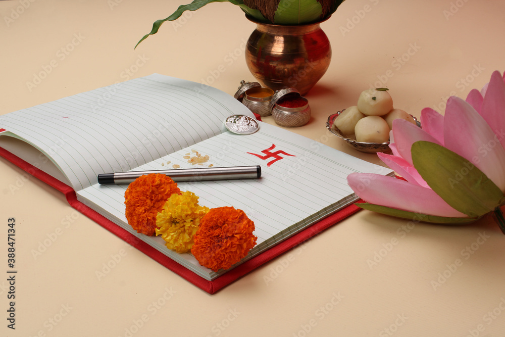 Red accounting note book / bahi khata with copper kalash, sweets ...