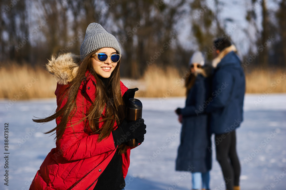 Young friends having fun outdoors in winter time. Concept of friendship ...