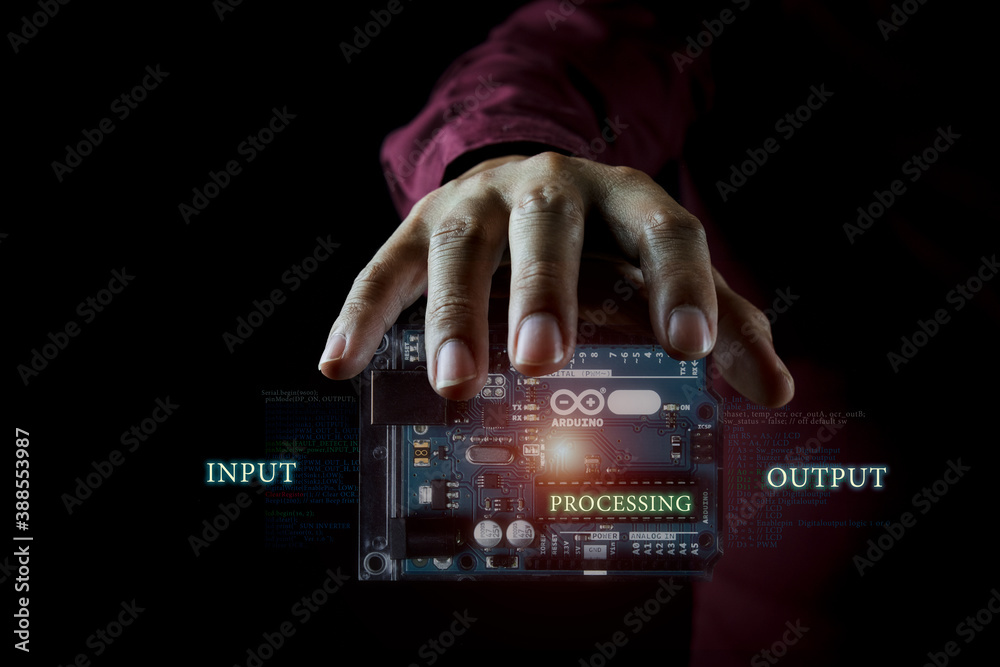 Arduino controller board element photo in dark background with ...