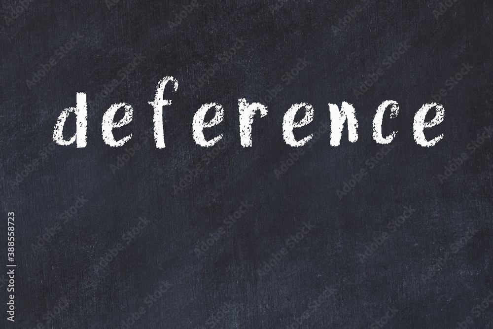 Photo College chalk desk with the word deference written on in ...
