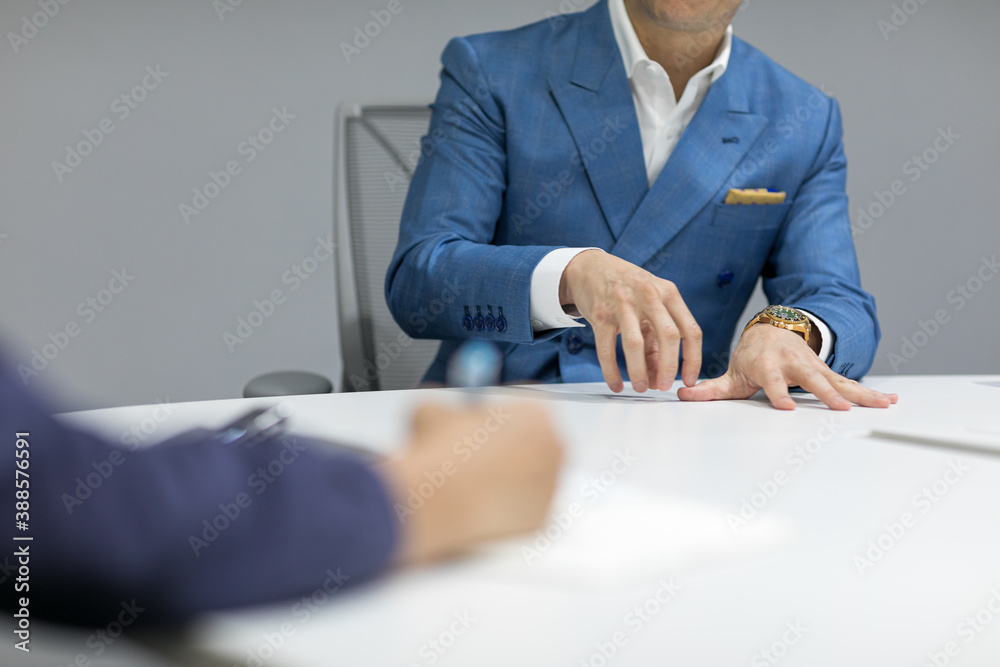 A female reporter in an interview room writes notes Stock Photo | Adobe ...