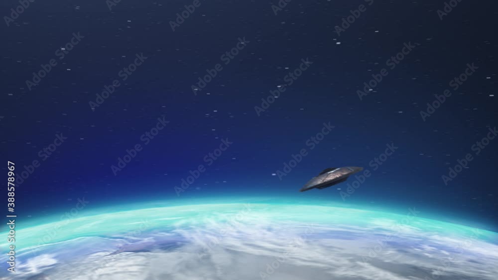 Alien spaceship ufo Flying over Earth atmosphere Flying saucer rotates ...