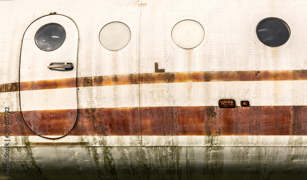 Old plane fuselage. Plane wreck at the aviation museum. Airplane doors ...