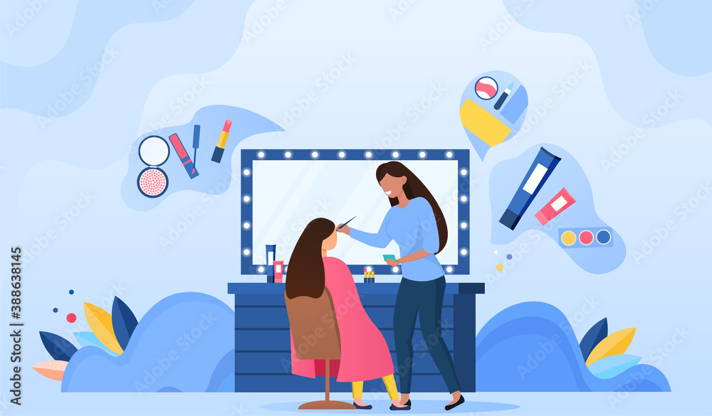 Makeup artist doing makeup for woman in beauty salon. Professional ...