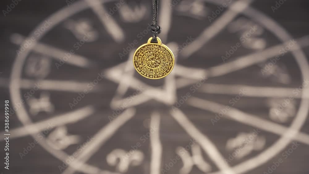 amulet of predictions on the background of the magic circle. helps in ...