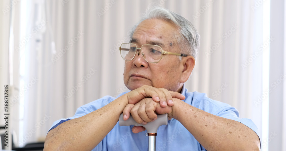 Foto de Perfect portrait of old man feel lonely. Uncle Asian elderly ...