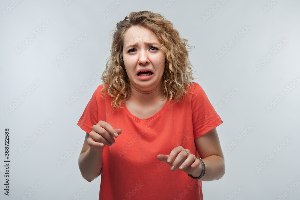 Image of dissatisfied girl doing disgust face because aversion reaction ...