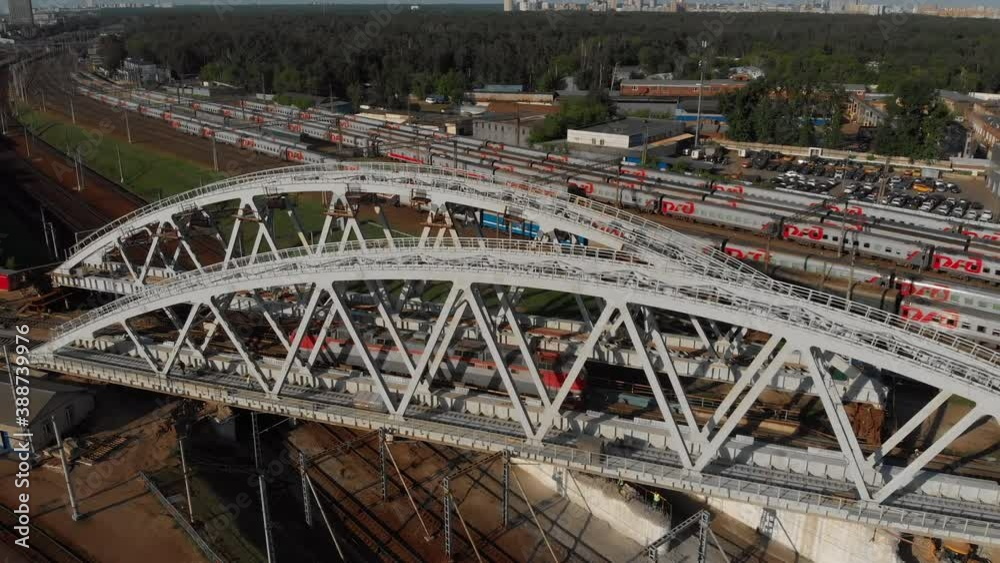 Construction of a railway bridge in the metropolis. Train rides, top ...