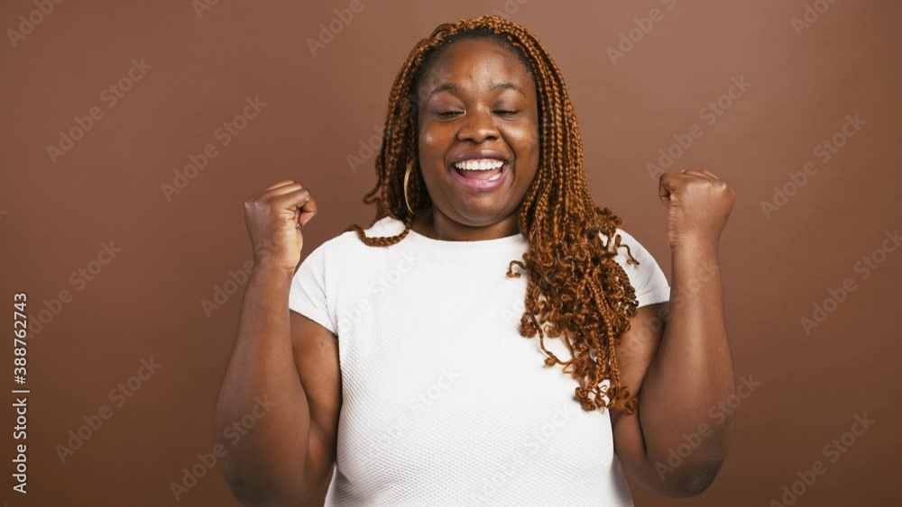 Vidéo Stock I Did It. Happy black girl shouting YES and raising hands ...