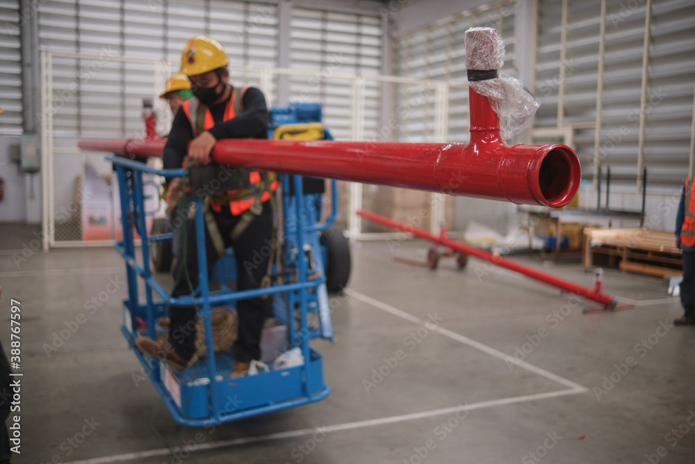 Install fire sprinkler system. In the industrial plant, pipe assembly ...