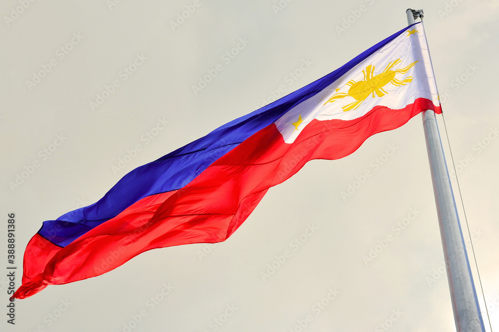 Philippine national flag in Manila, Philippines Stock Photo | Adobe Stock