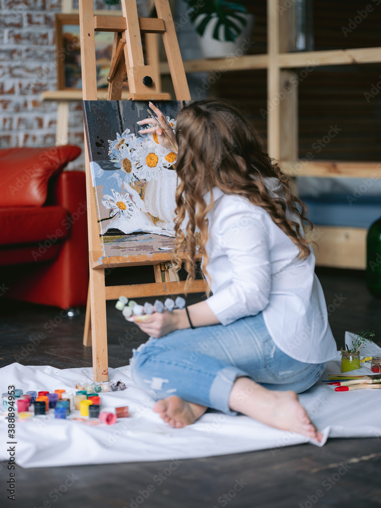 Inspired girl drawing her picture Stock Photo | Adobe Stock